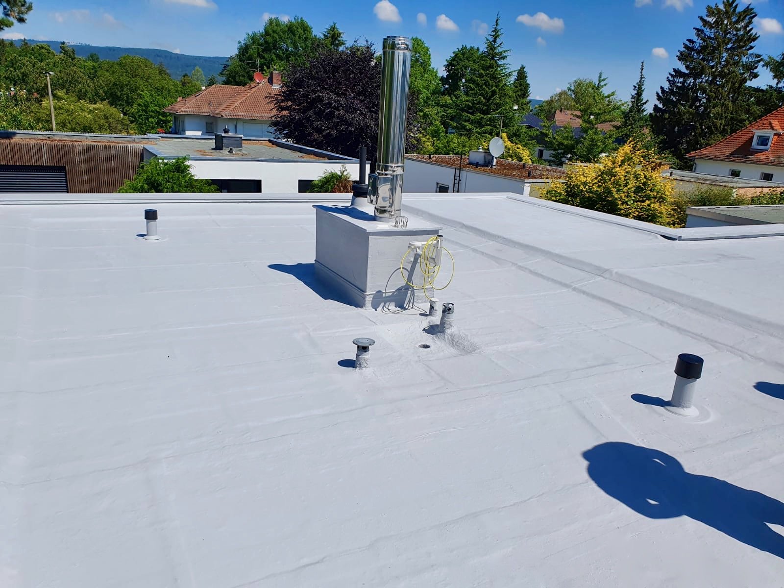 Bitumendach Flachdachsanierung mit Flüssigkunststoff