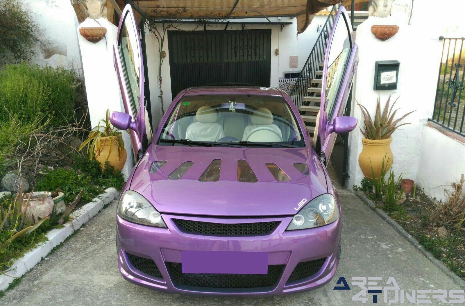 REPORTAJE COCHE TUNING AREA4TUNERS Opel Corsa Purple Ride Bubble