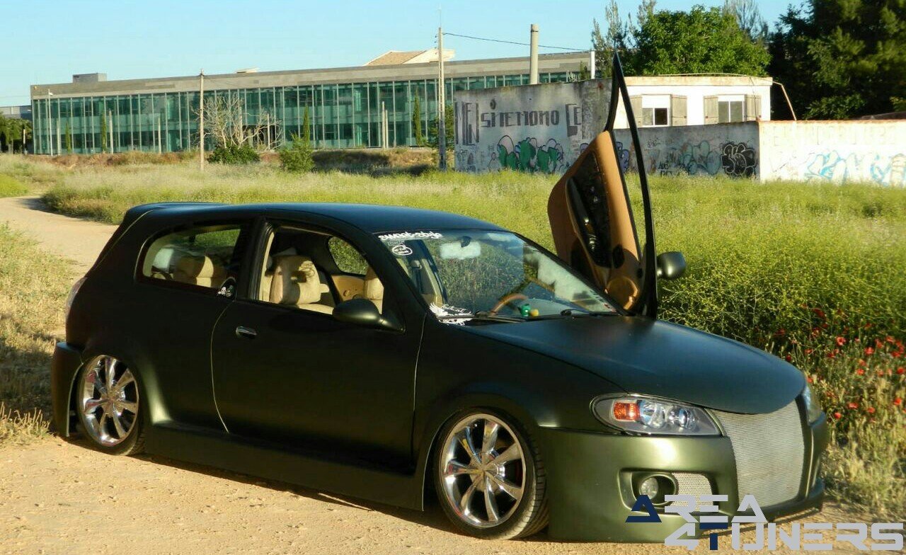 AREA4TUNERS COCHE TUNING NISSAN ALMERA OLIVA MATE