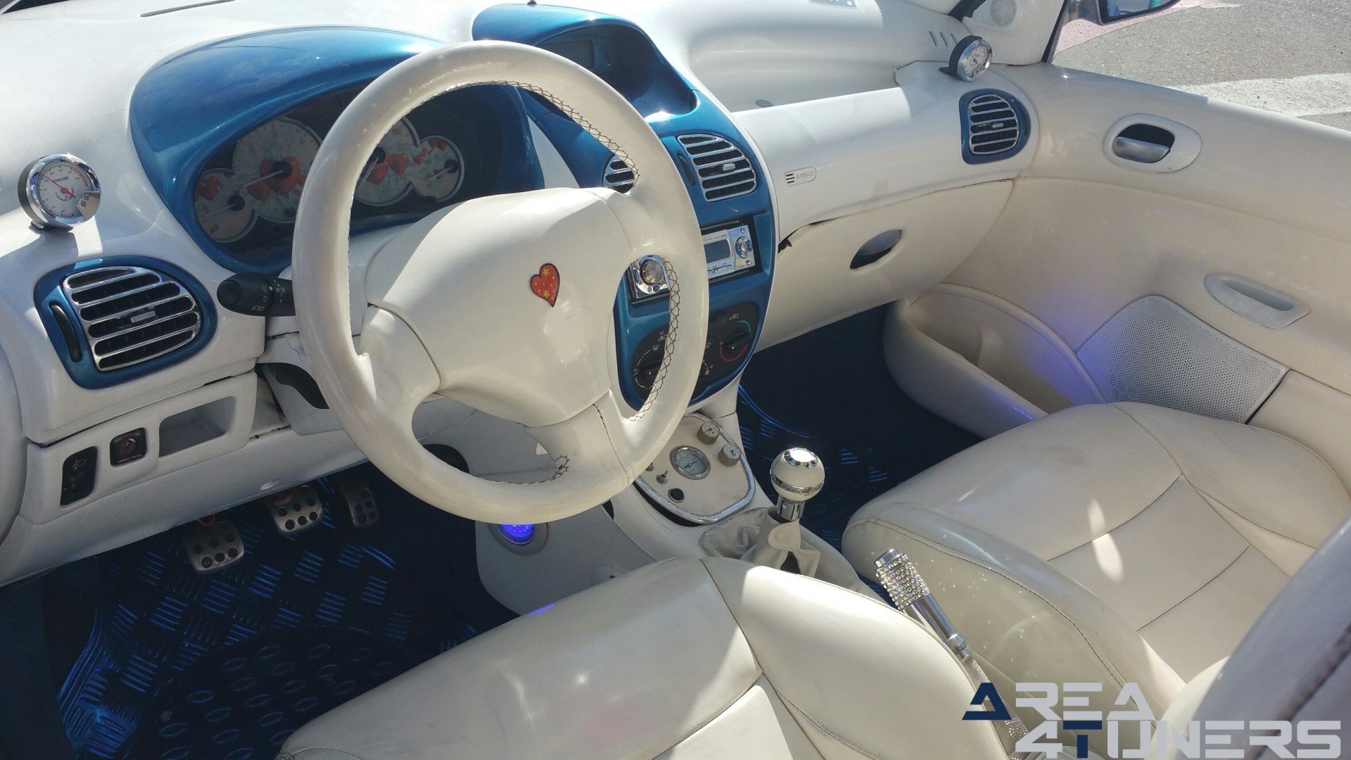 AREA4TUNERS COCHE TUNING PEUGEOT 206 HEART SHINE