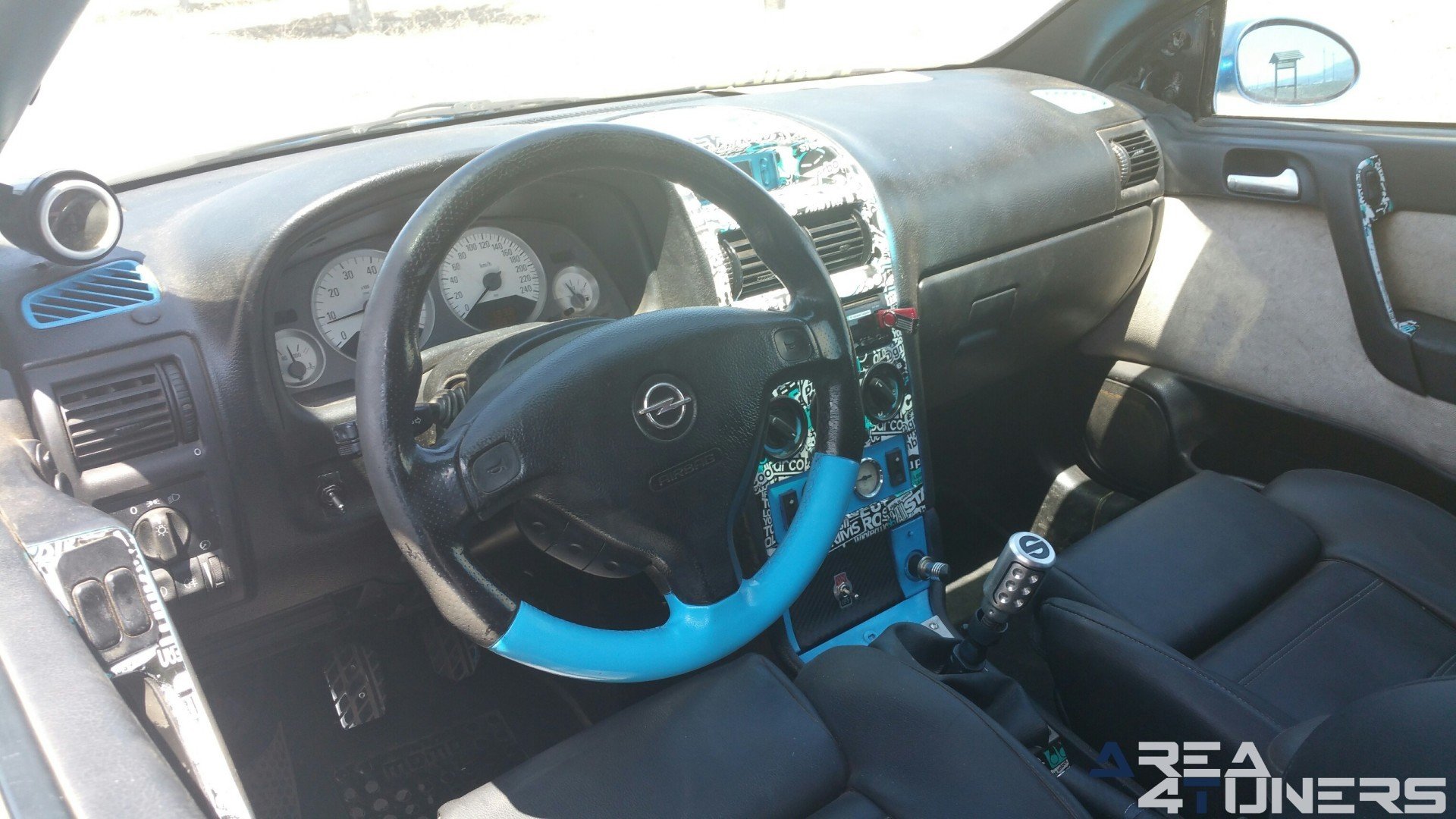 AREA4TUNERS COCHE TUNING OPEL ASTRA BLUE LIKE SKY