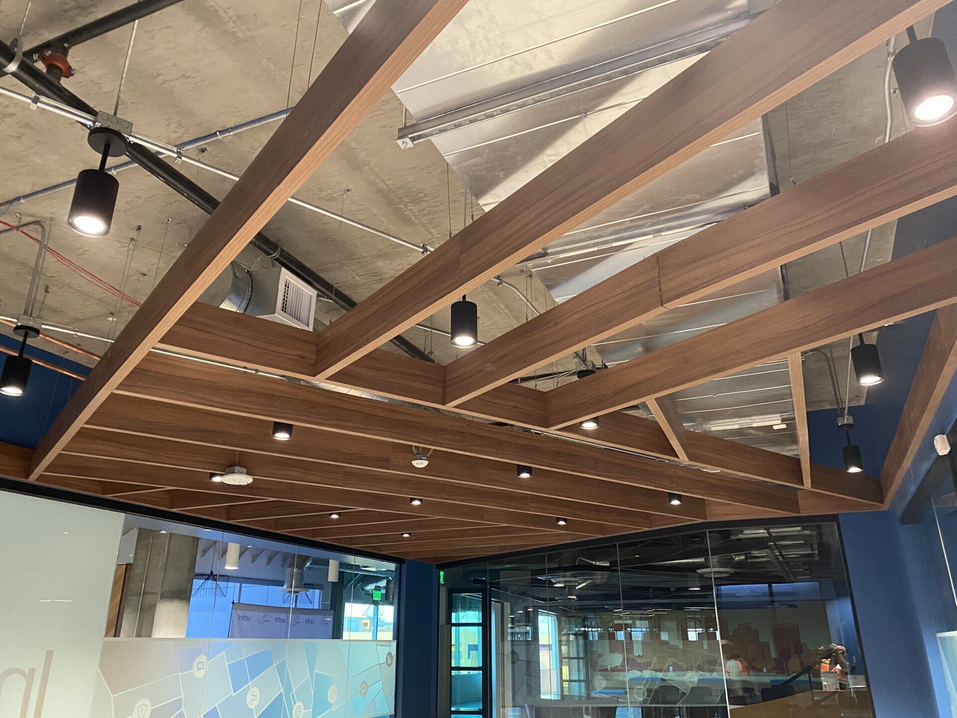 Acoustic wood ceiling tiles and lightweight concrete panels