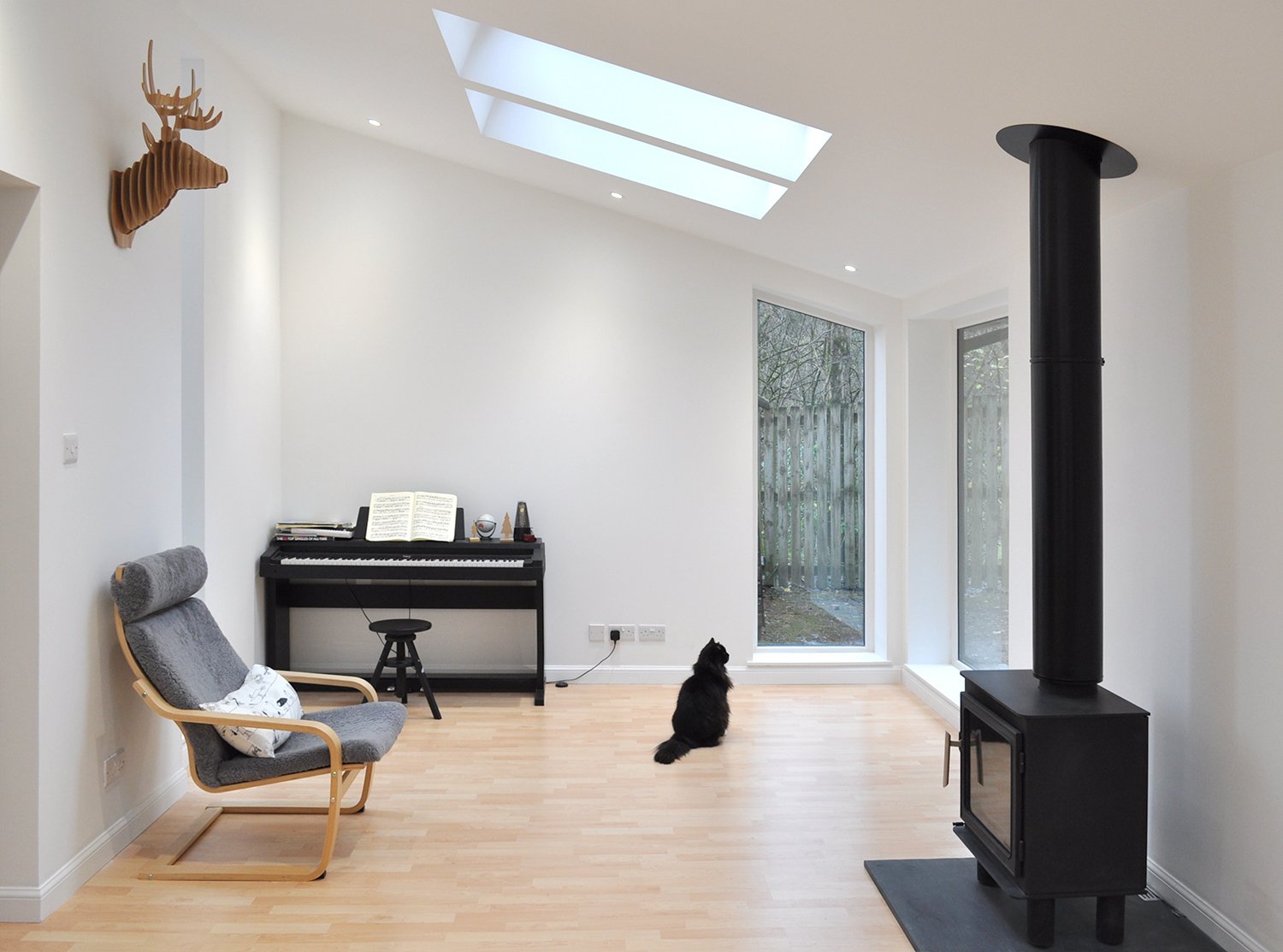Contemporary zinc and timber clad extension to a period home in Lenzie.
