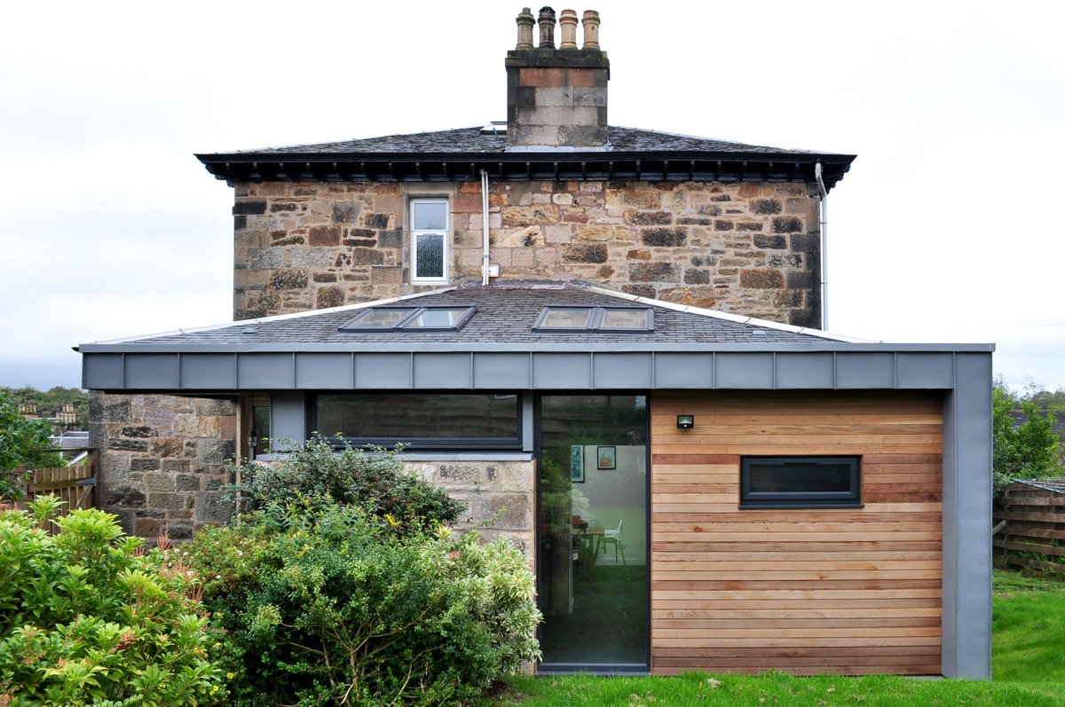 Contemporary zinc and timber clad extension to a period home in Lenzie.