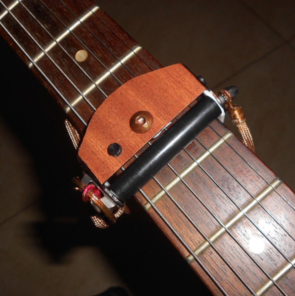 Sixth Finger rolling capo - fastest in the world