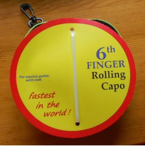 Sixth Finger rolling capo - fastest in the world
