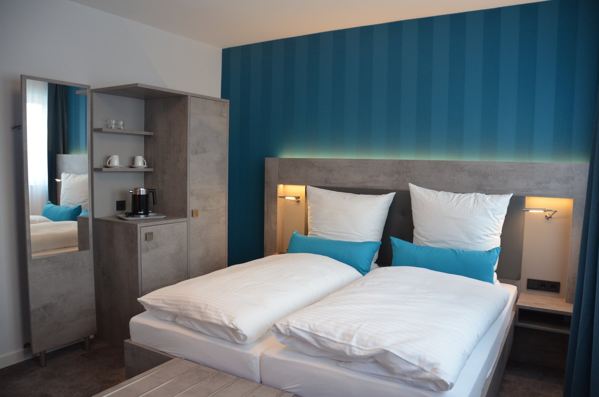 Ausstattung der Hotelzimmer mit Beschreibung Bildern