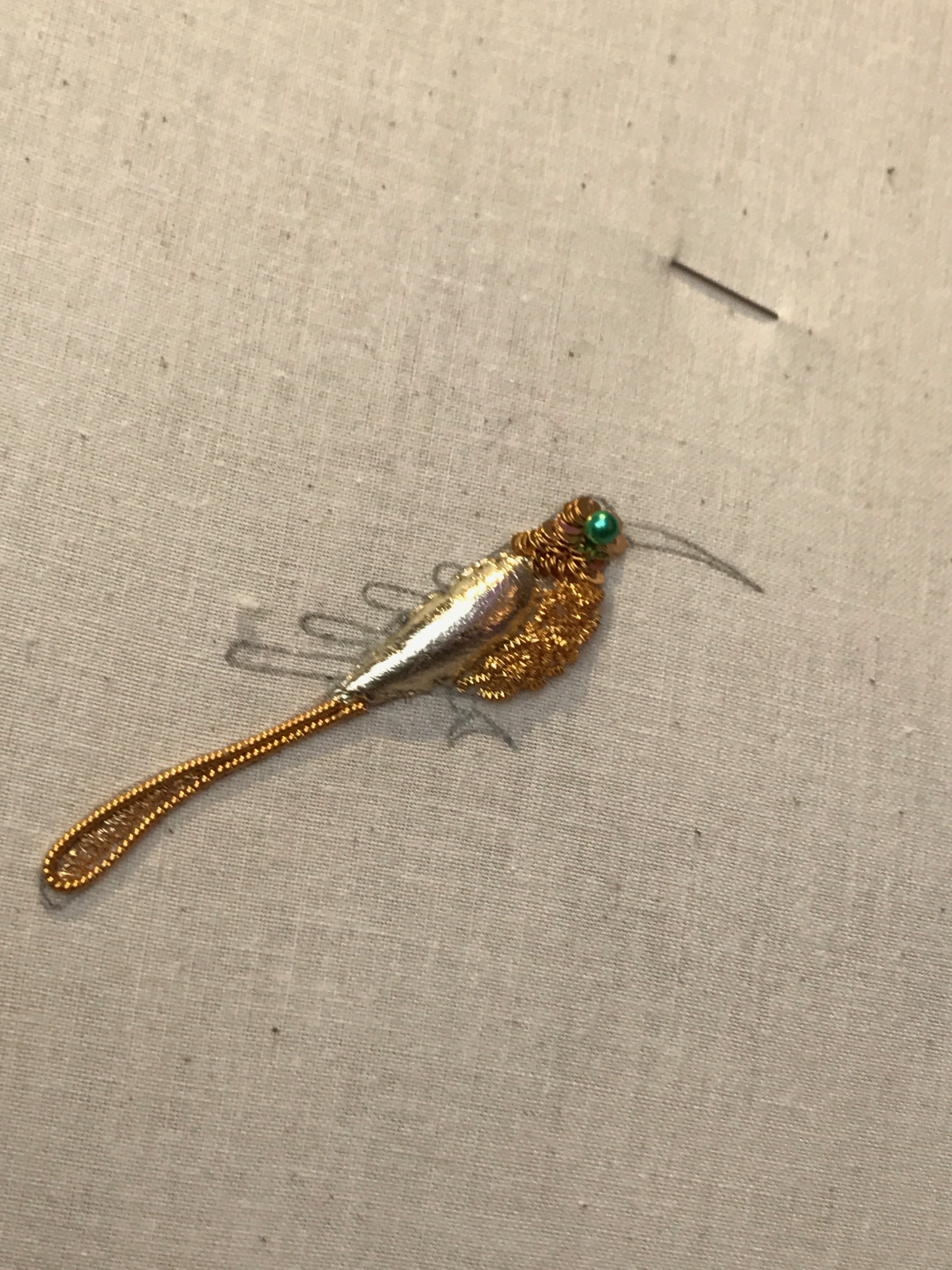 A Goldwork Bird.